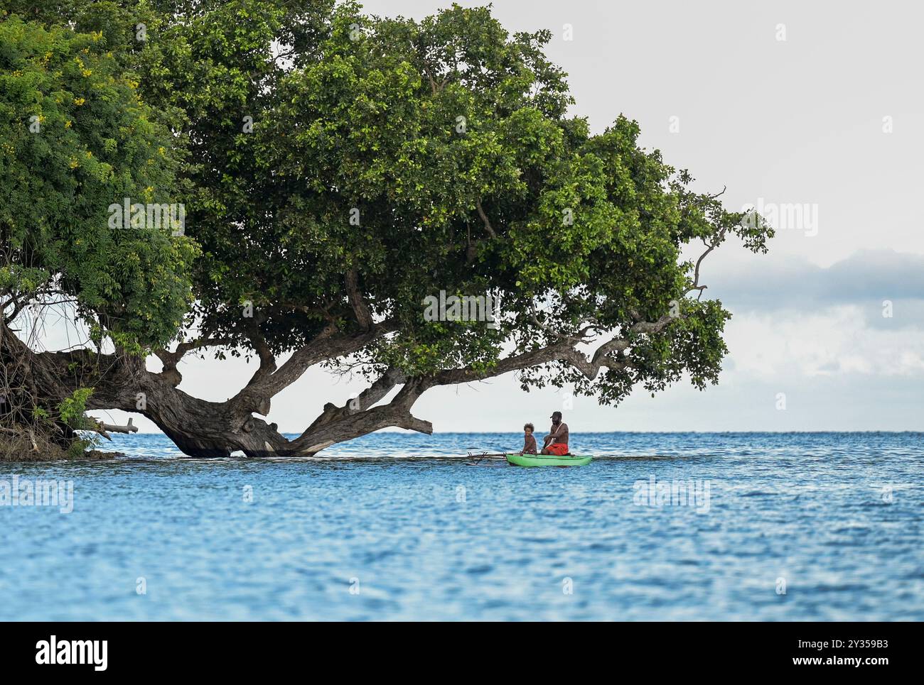 PAPUA NEW GUINEA, Madang, fishing village Riwo at sea coast, affected ...