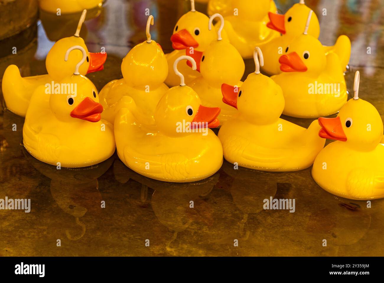 Detail of a Group of Bright Yellow Plastic Ducks - Hook-a Ducks Stall ...