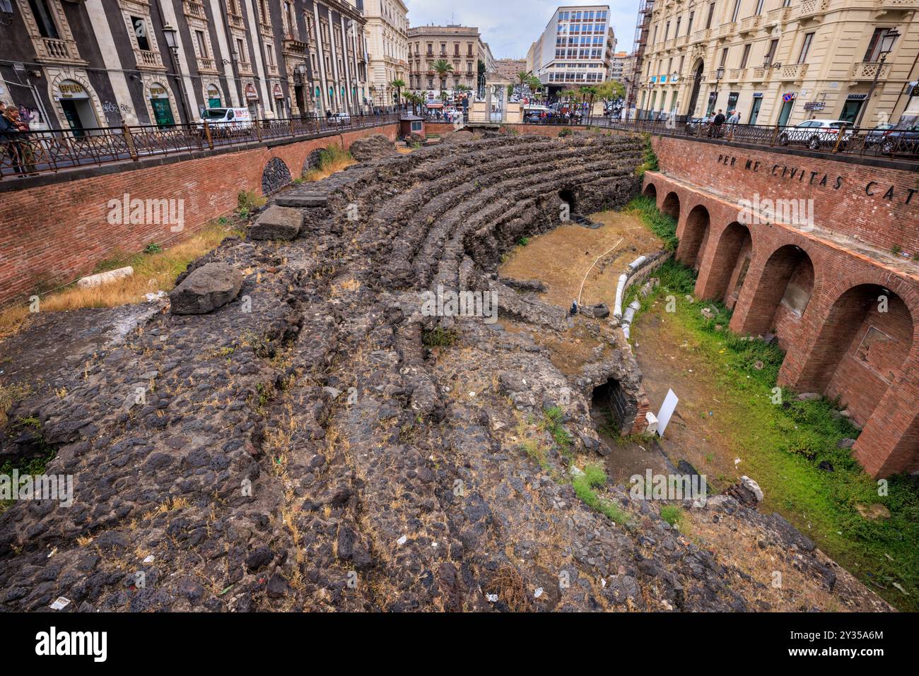 The basalt stone blocks of the ancient Roman Amphitheatre at Catania ...