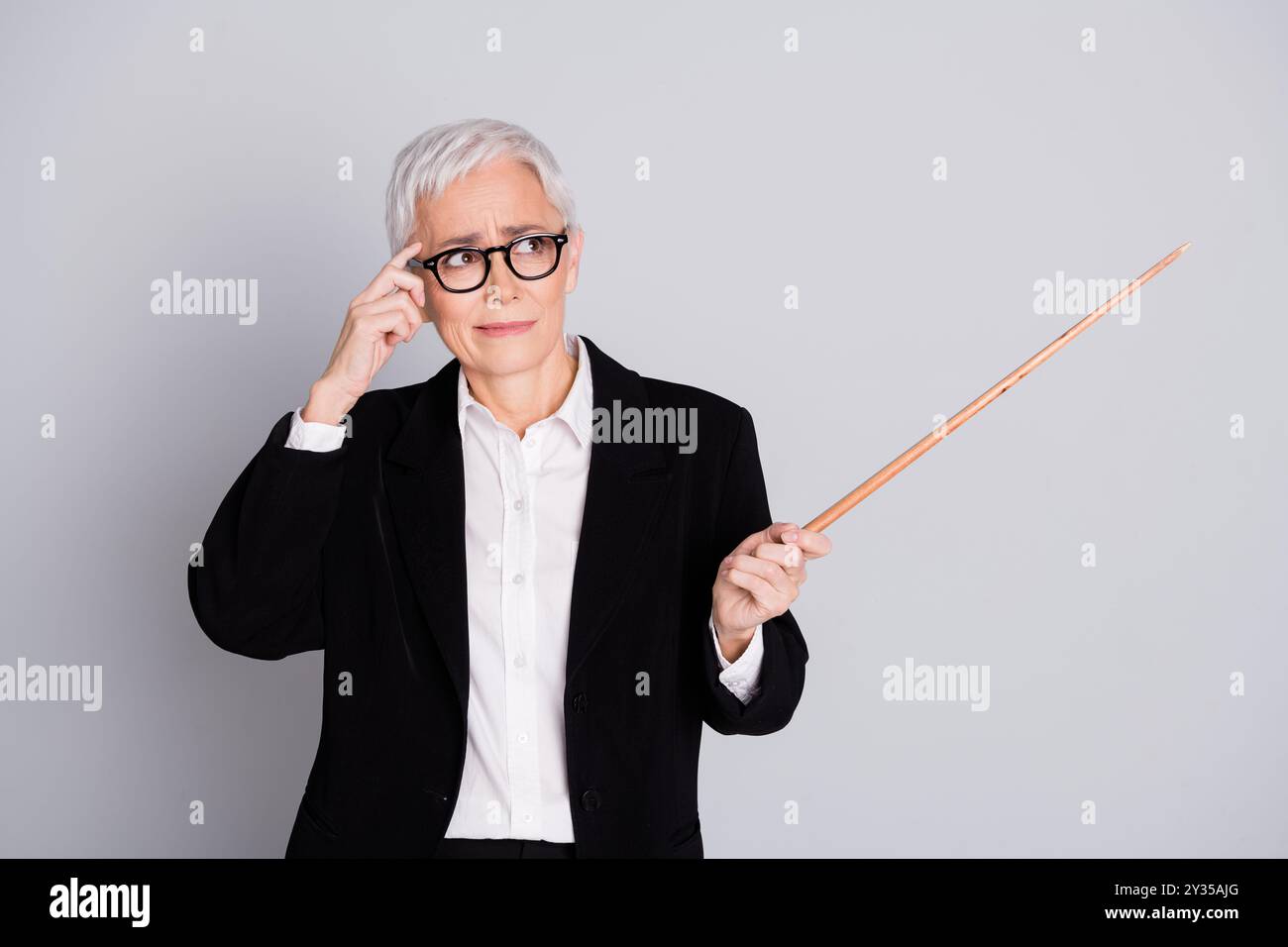 Photo of lovely pensioner lady teacher confused pointer empty space ...