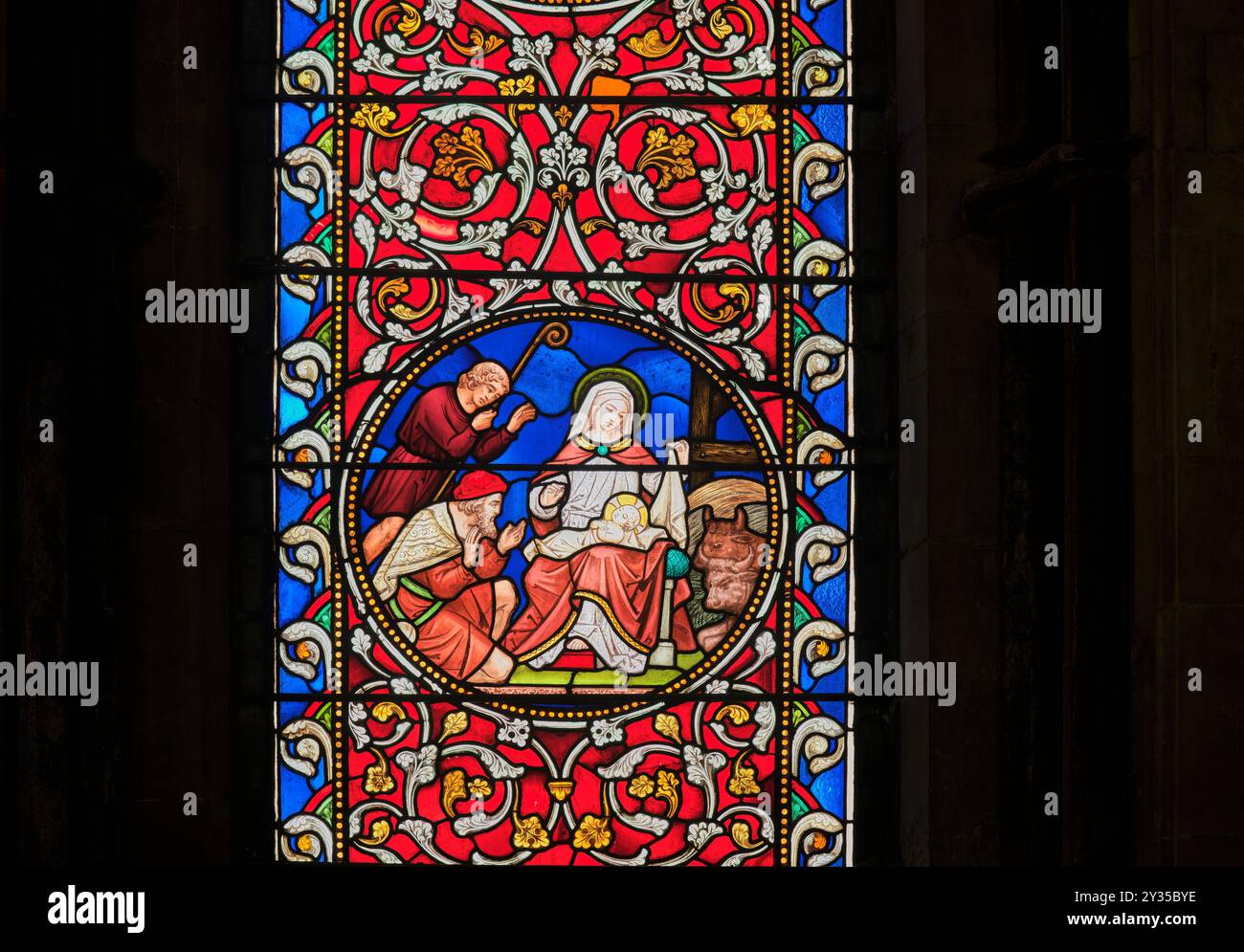 Shepherds visit the infant Jesus Christ, stained glass window in the ...