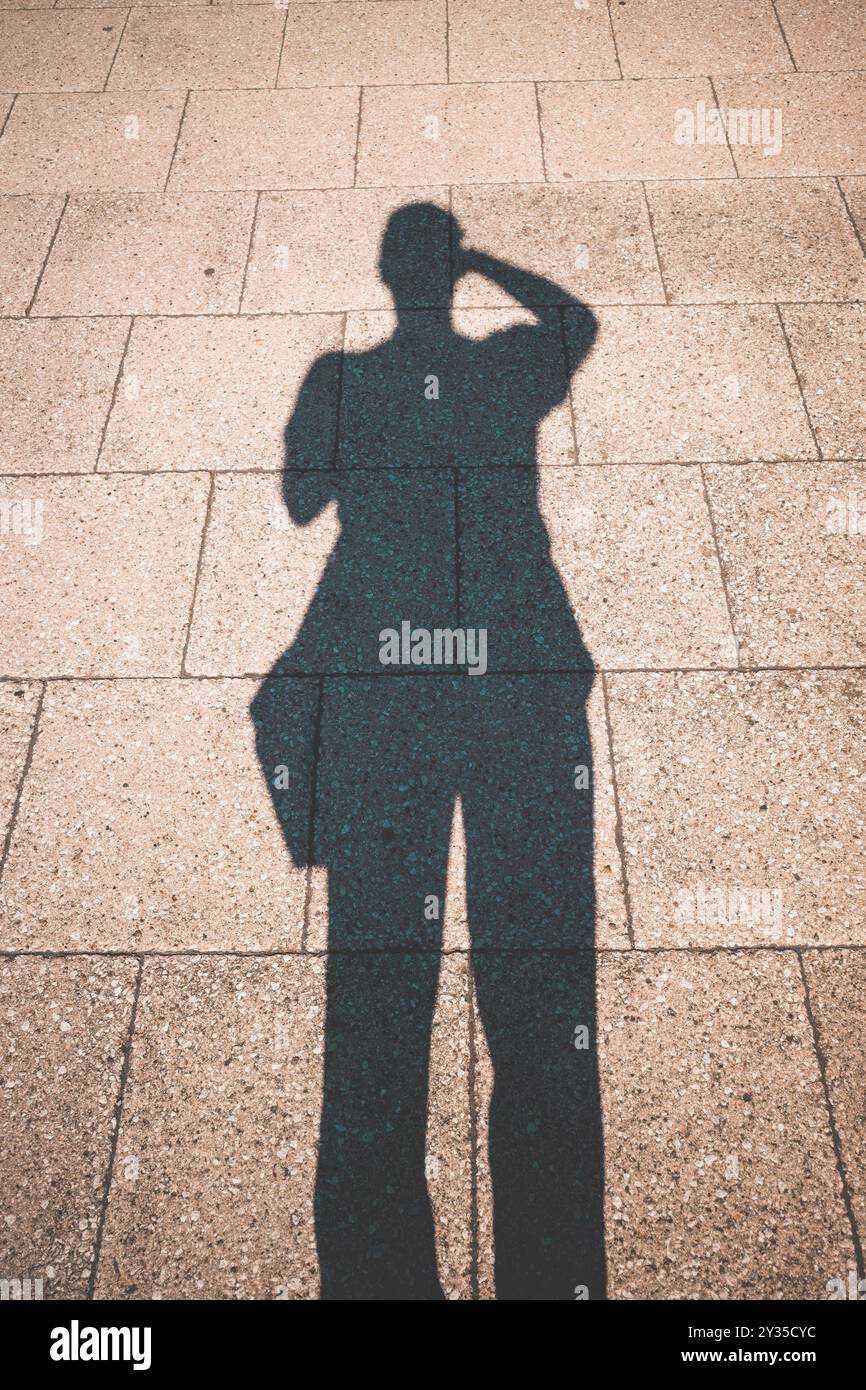 Shadow of man standing Stock Photo - Alamy