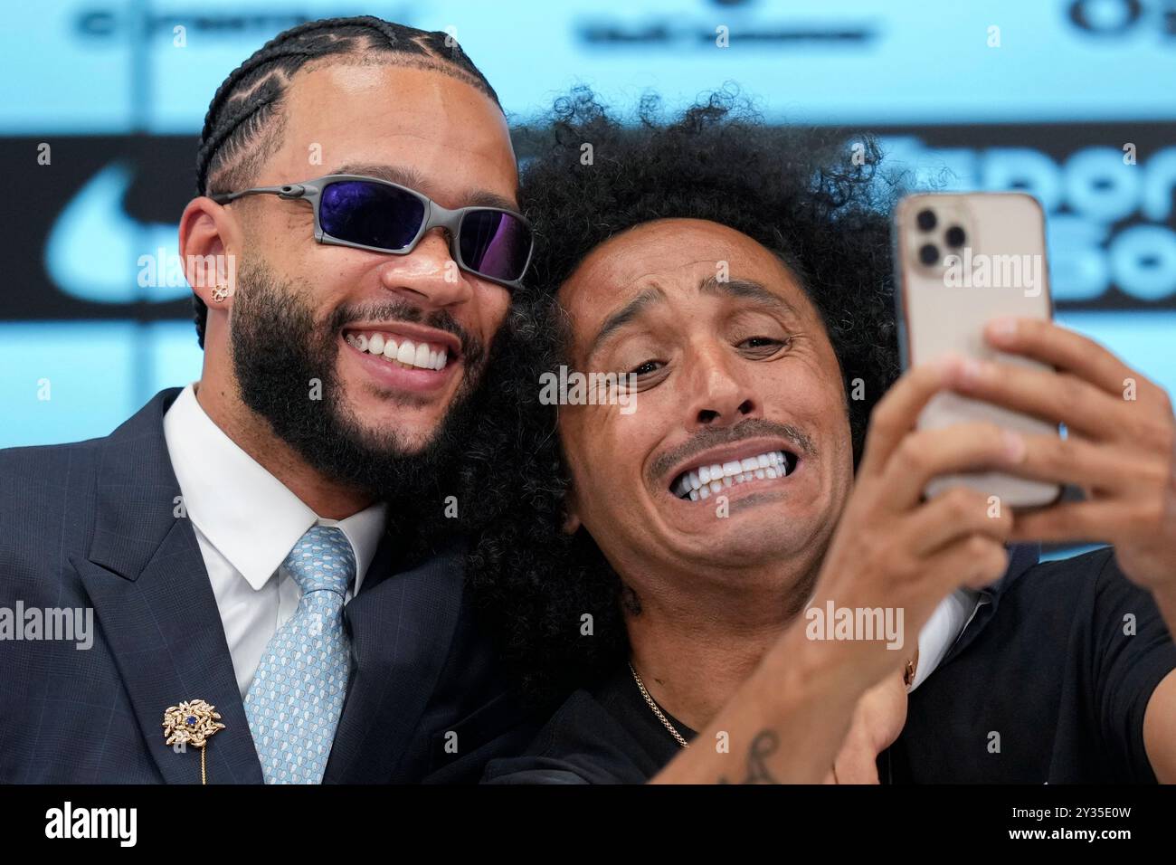 Soccer player Memphis Depay, of the Netherlands, left, poses for a ...