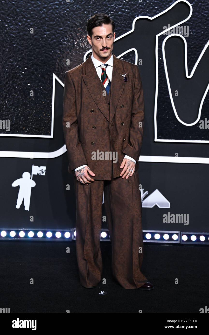 Elmont, USA. 11th Sep, 2024. Damiano David of Maneskin walking on the ...