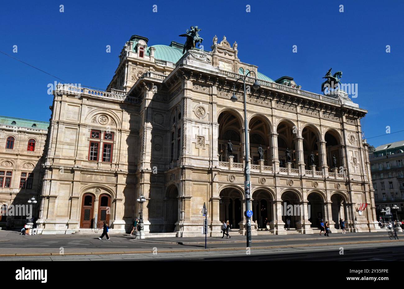 The landmark Vienna State Opera, located on the city's ring road, was ...