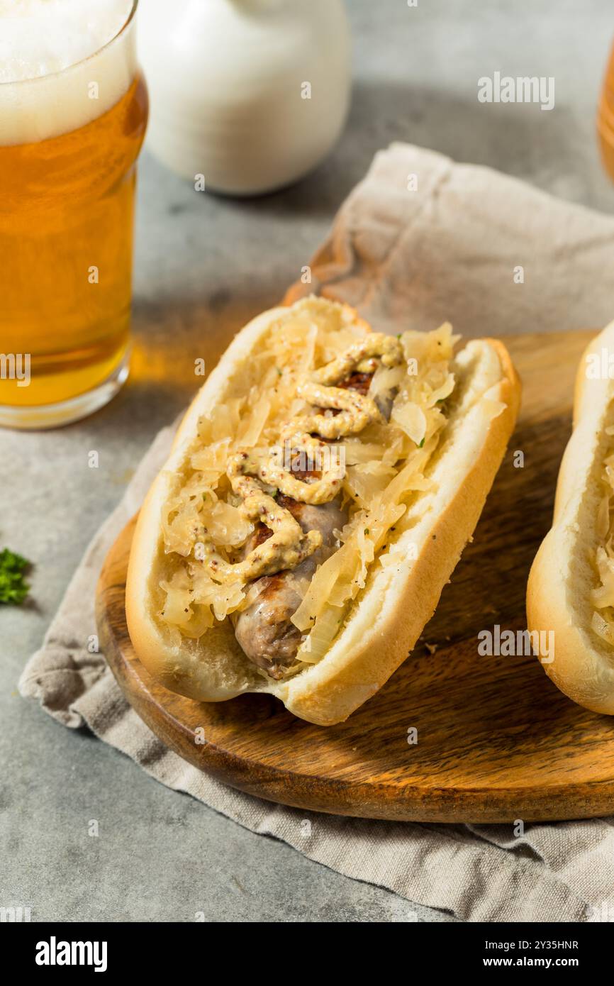 German Homemade Bratwurst Sandwiches with Sauerkraut and Beer for ...