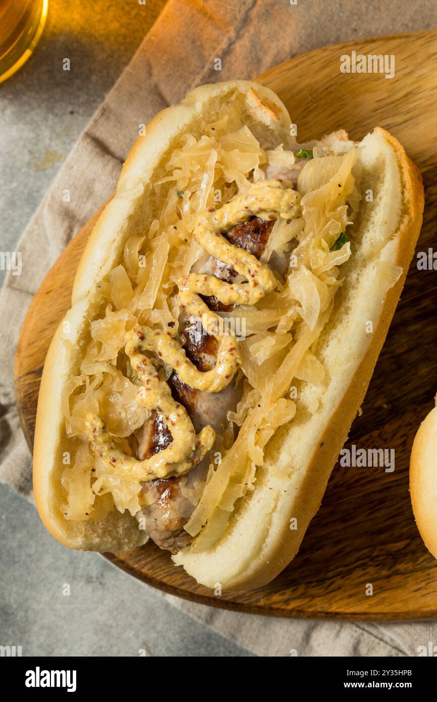 German Homemade Bratwurst Sandwiches with Sauerkraut and Beer for ...