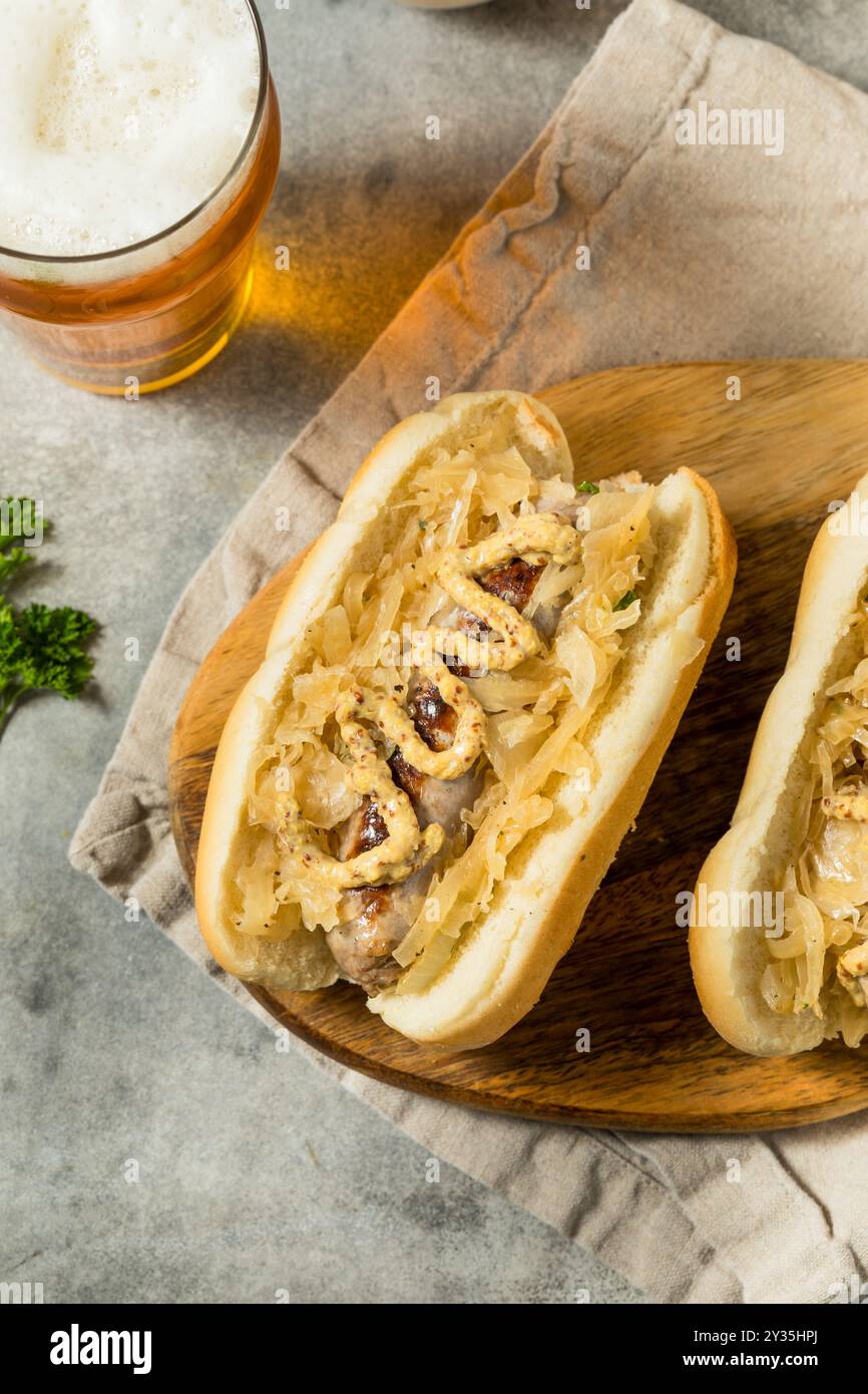 German Homemade Bratwurst Sandwiches with Sauerkraut and Beer for ...