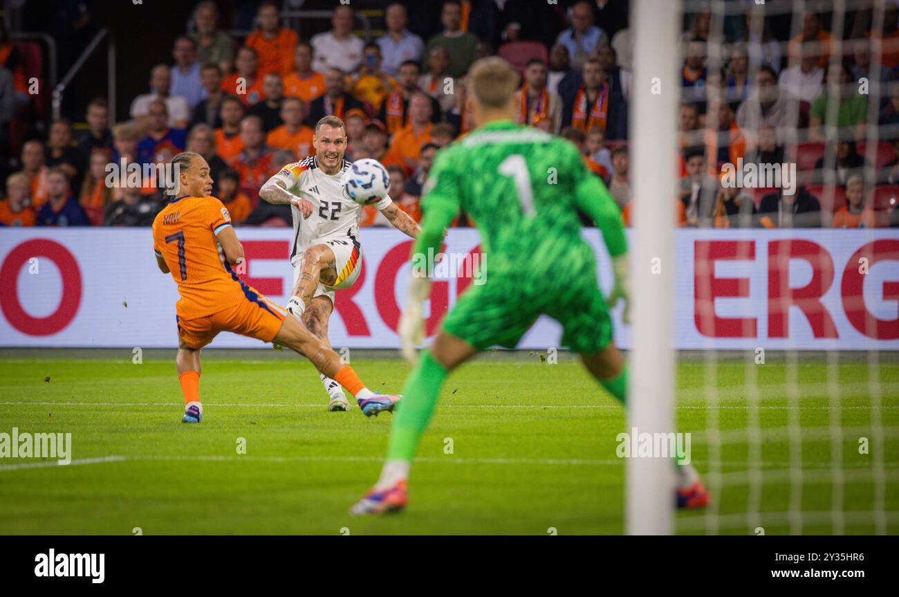 Amsterdam, Netherlands. 10th Sep 2024. David Raum (DFB) Xavi Simons ...
