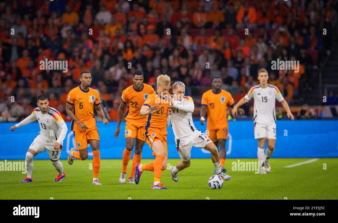 Amsterdam, Netherlands. 10th Sep 2024. Denzel Dumfries (NED) Jan Paul ...
