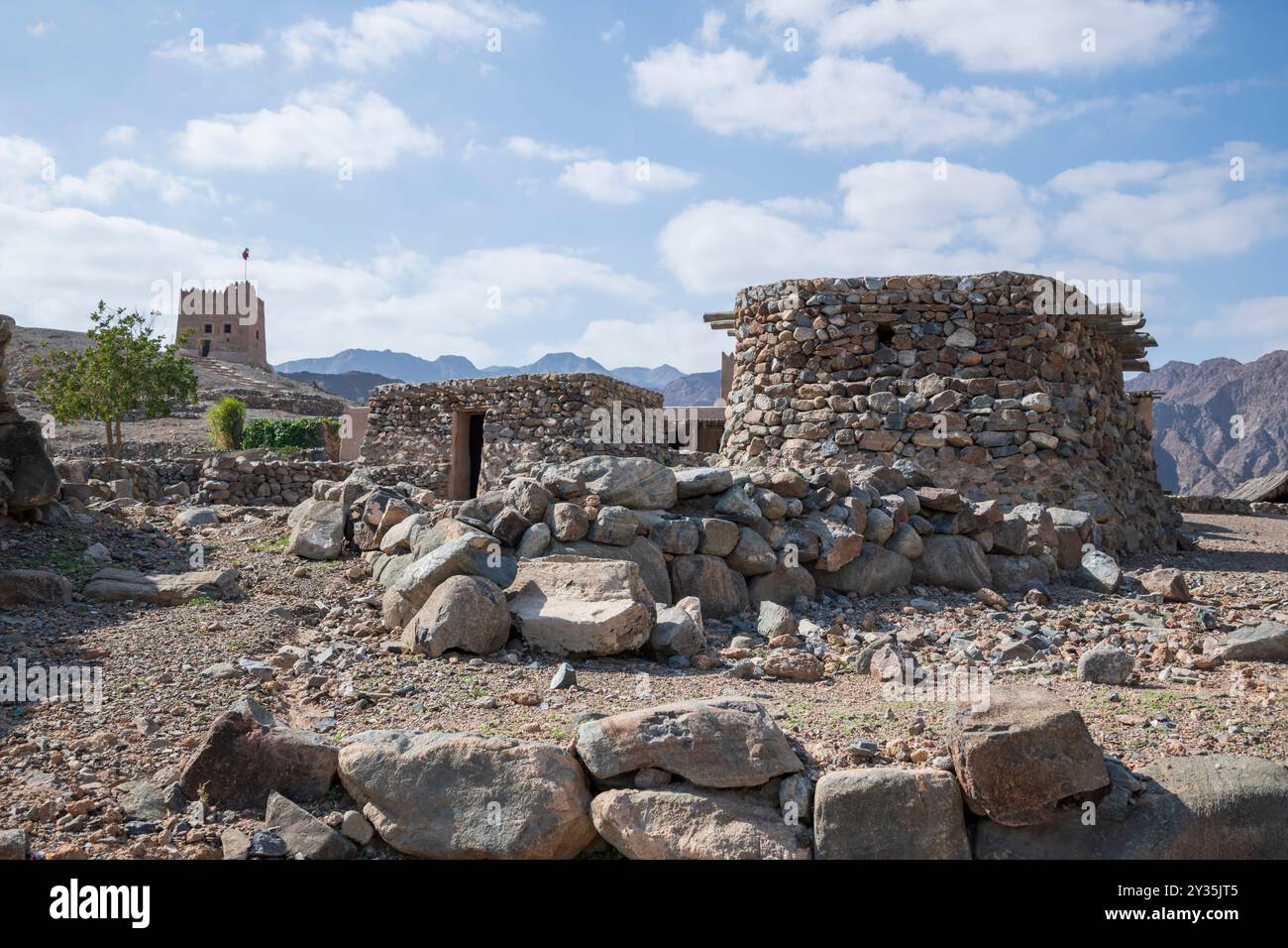 Traditional houses at Al Hayl Fortress, built in 1930, on a mountain in the scenic Al Hayl ...