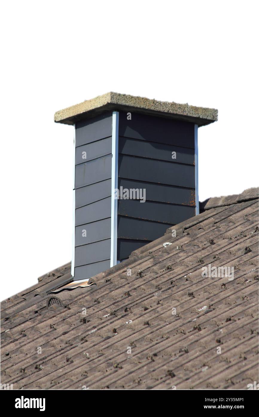 clad in slate shingles chimney, blue sky in background Stock Photo - Alamy