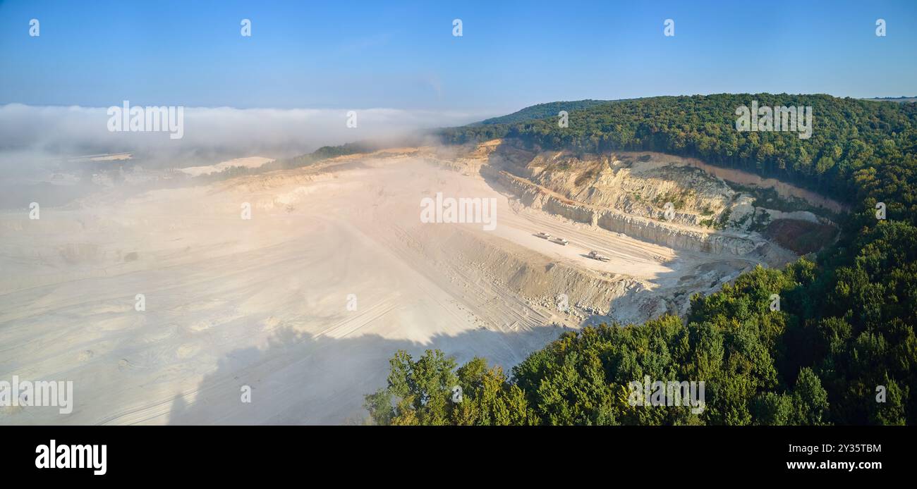 Aerial view of open pit mining of limestone materials for construction ...