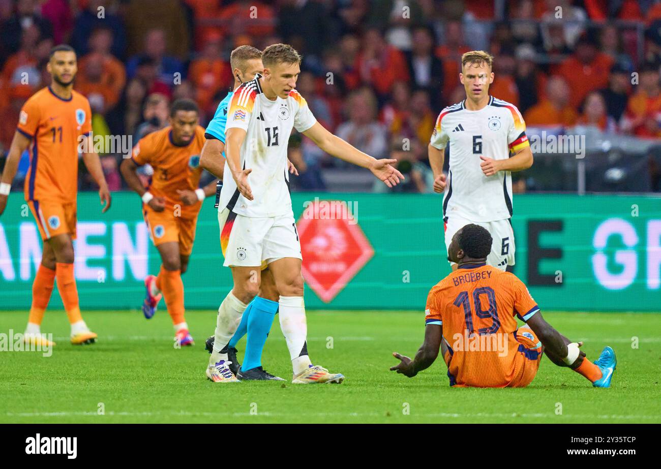 Nico Schlotterbeck, DFB 15 Joshua Kimmich, DFB 6 angry with Brian ...