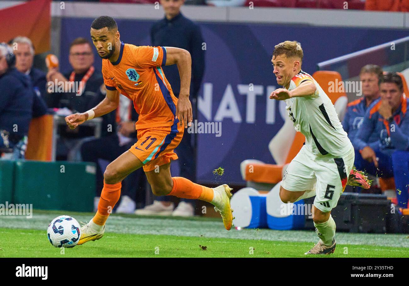 Joshua Kimmich, DFB 6 compete for the ball, tackling, duel, header, zweikampf, action, fight ...