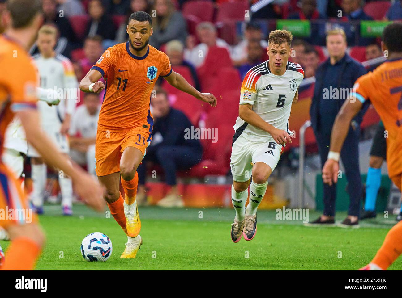 Joshua Kimmich, DFB 6 compete for the ball, tackling, duel, header, zweikampf, action, fight ...