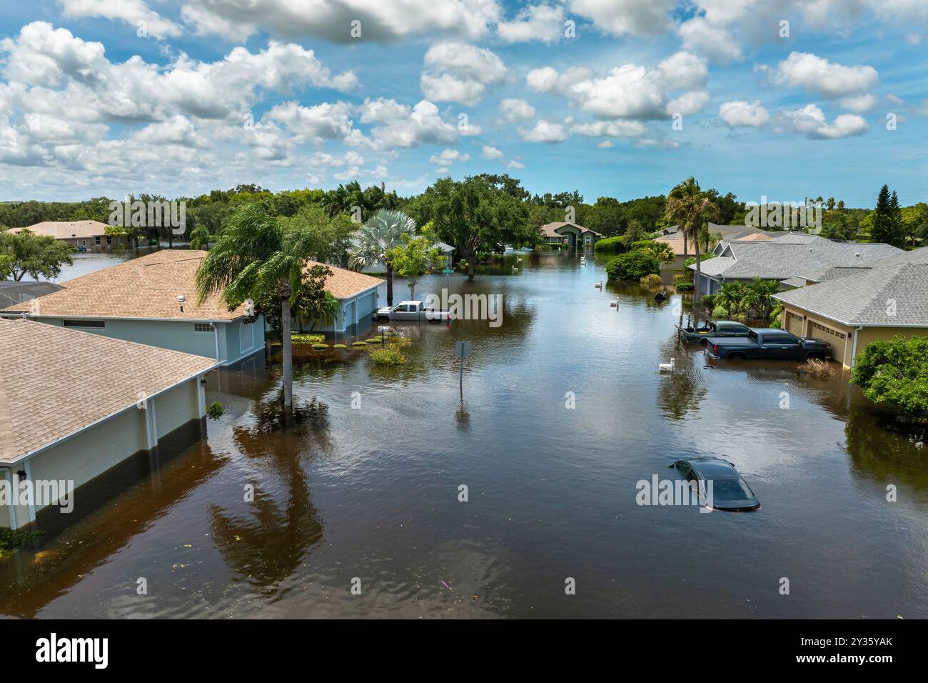 Flooded Florida street with stuck car after hurricane Debby rainfall ...