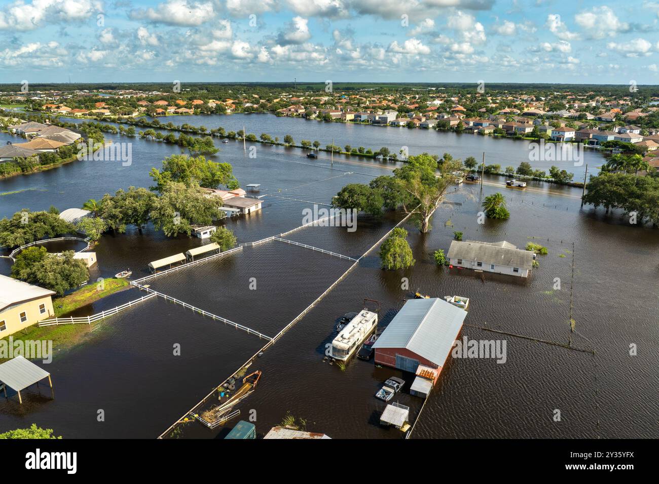 Flooded rural area with underwater buildings from hurricane Debby ...