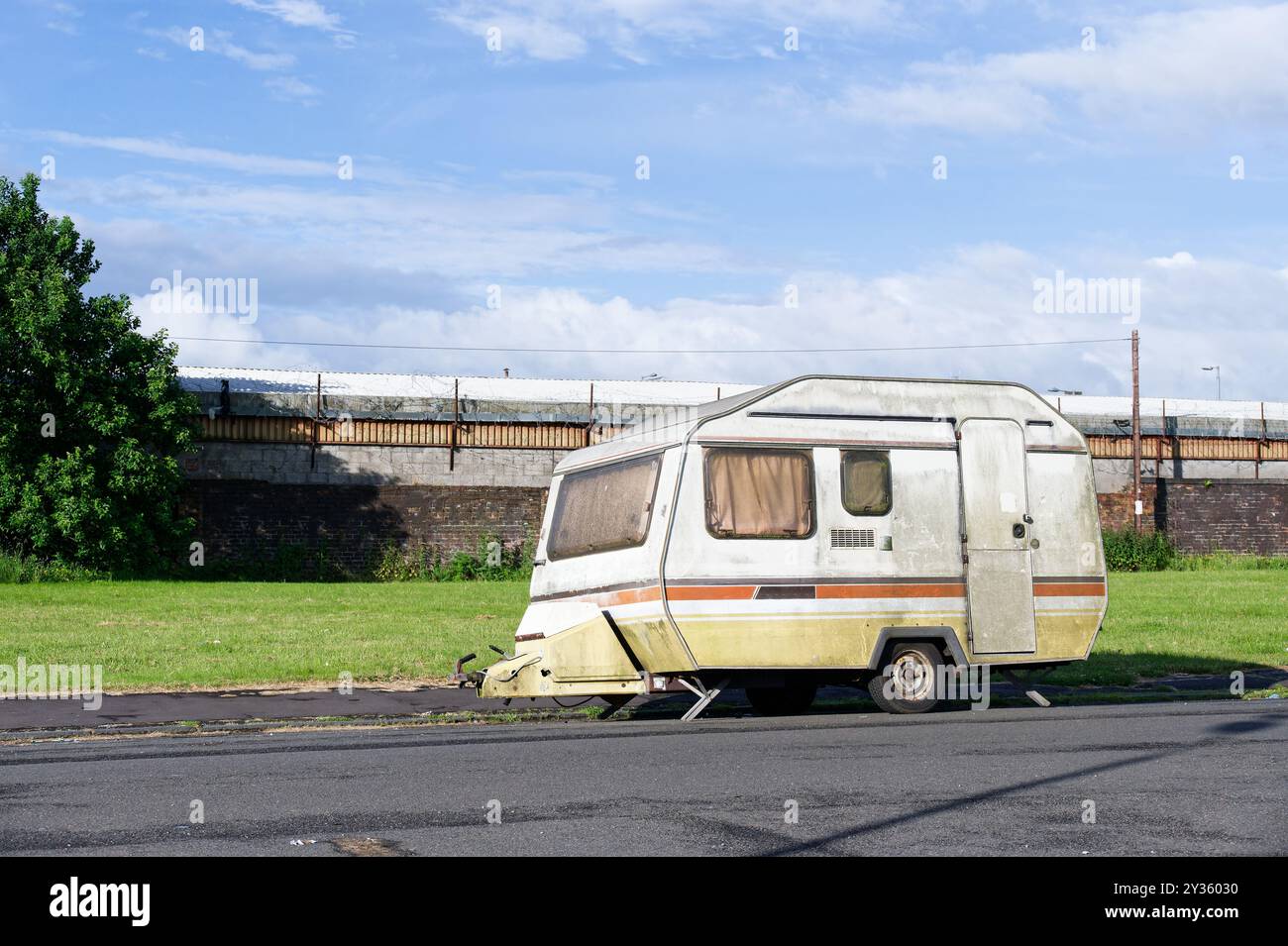 Caravan abandoned and dumped in street waiting to be removed Stock ...
