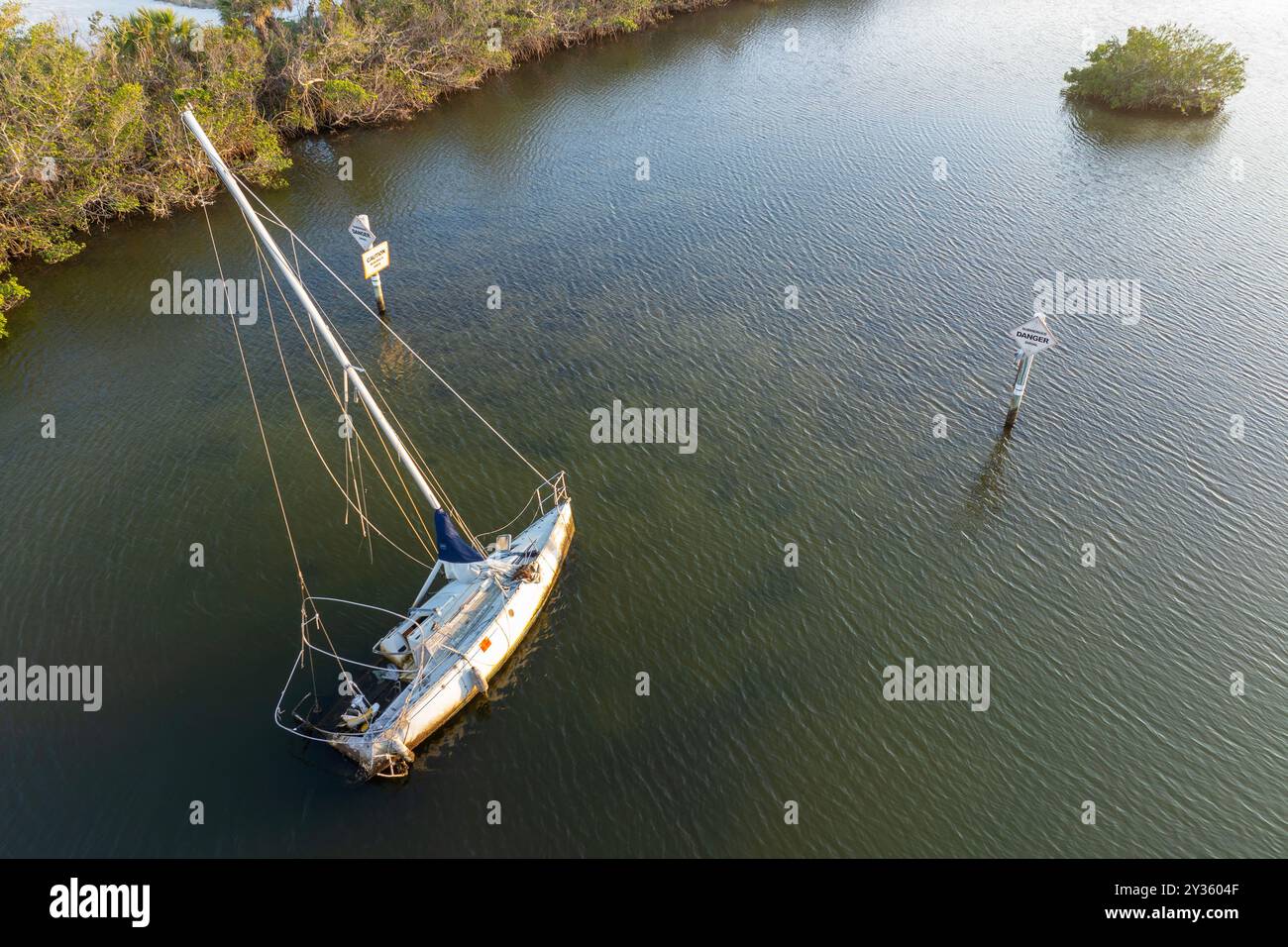 Destroyed sailing yacht capsized on hi-res stock photography and images ...