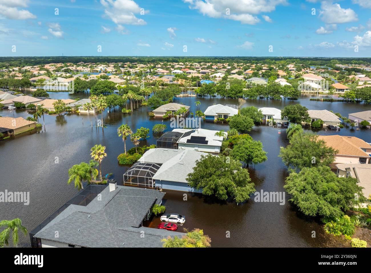 Hurricane flooded cars and homes in residential community in Florida ...