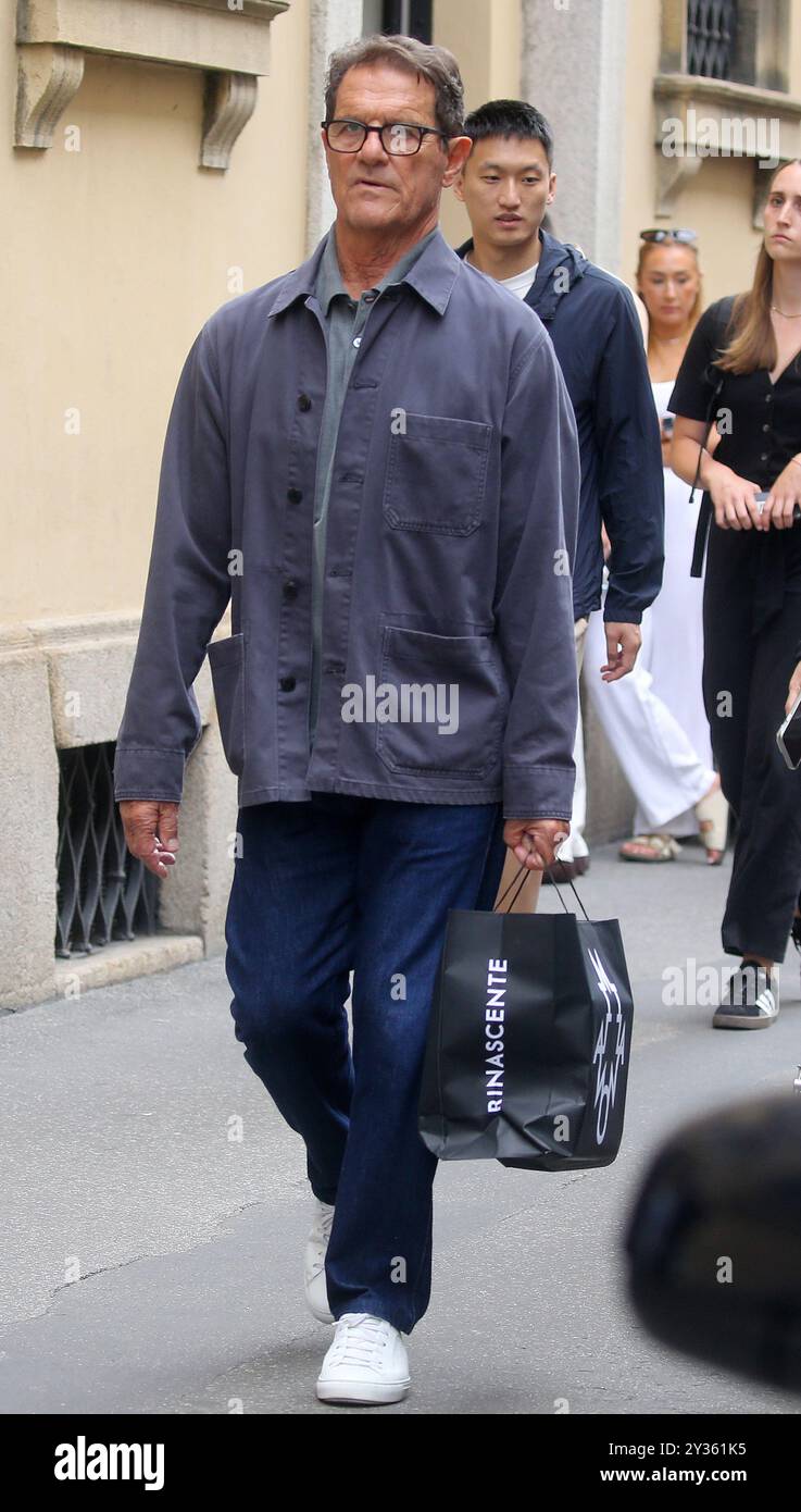 Fabio Capello walks with his wife Laura in via Montenapoleone Stock ...