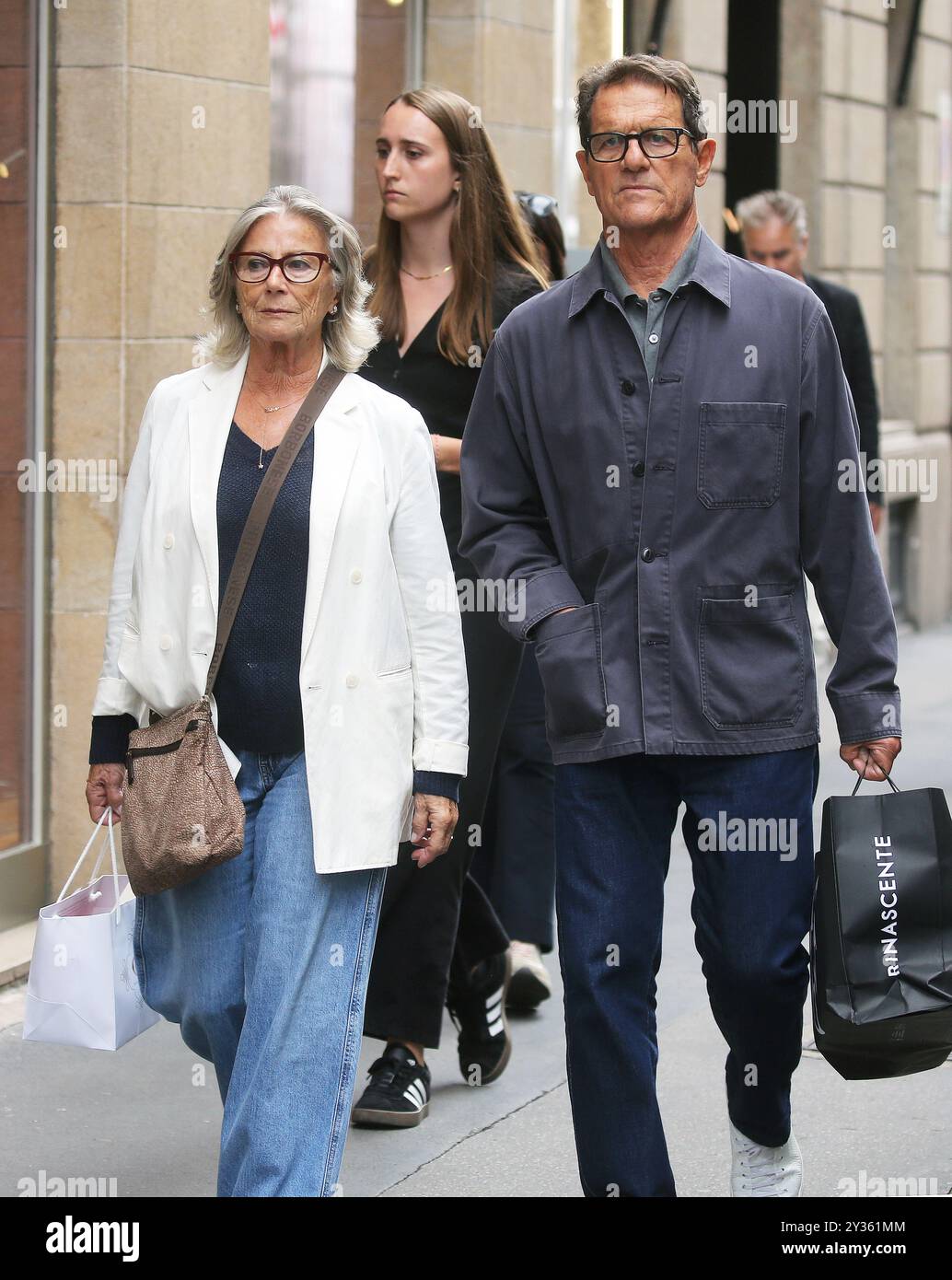 Fabio Capello walks with his wife Laura in via Montenapoleone Stock ...