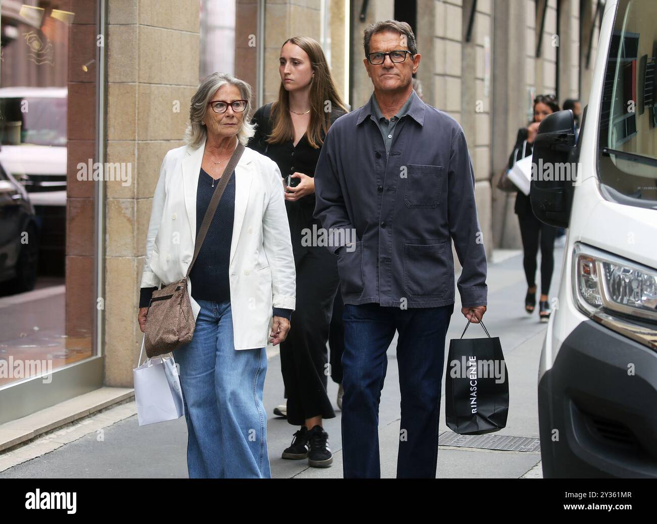 Fabio Capello walks with his wife Laura in via Montenapoleone Stock ...
