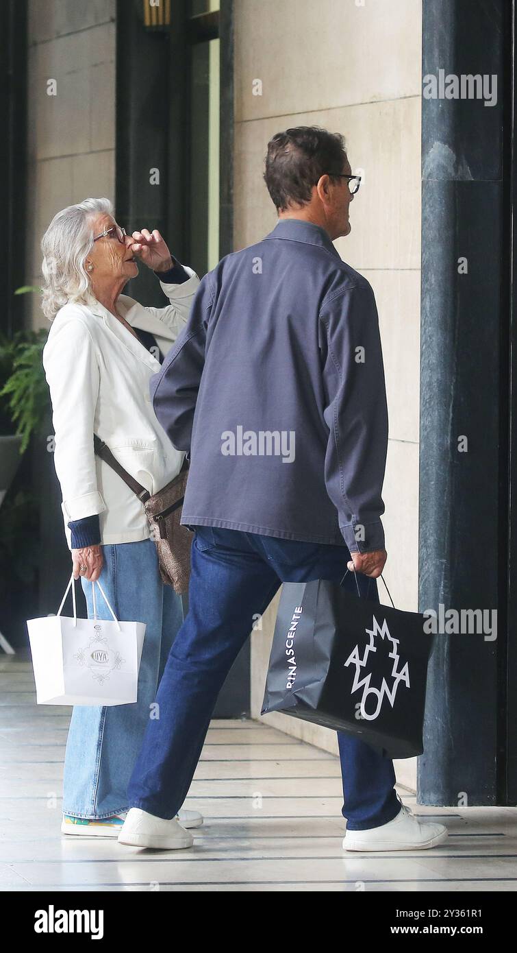 Fabio Capello walks with his wife Laura in via Montenapoleone Stock ...