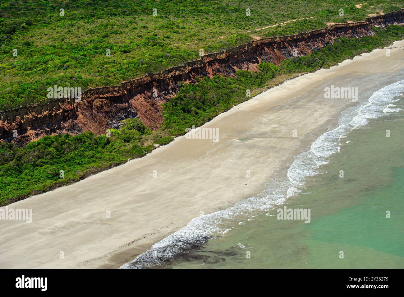 Colorful cliffs typical of the northeastern coast of Brazil. Baía da ...