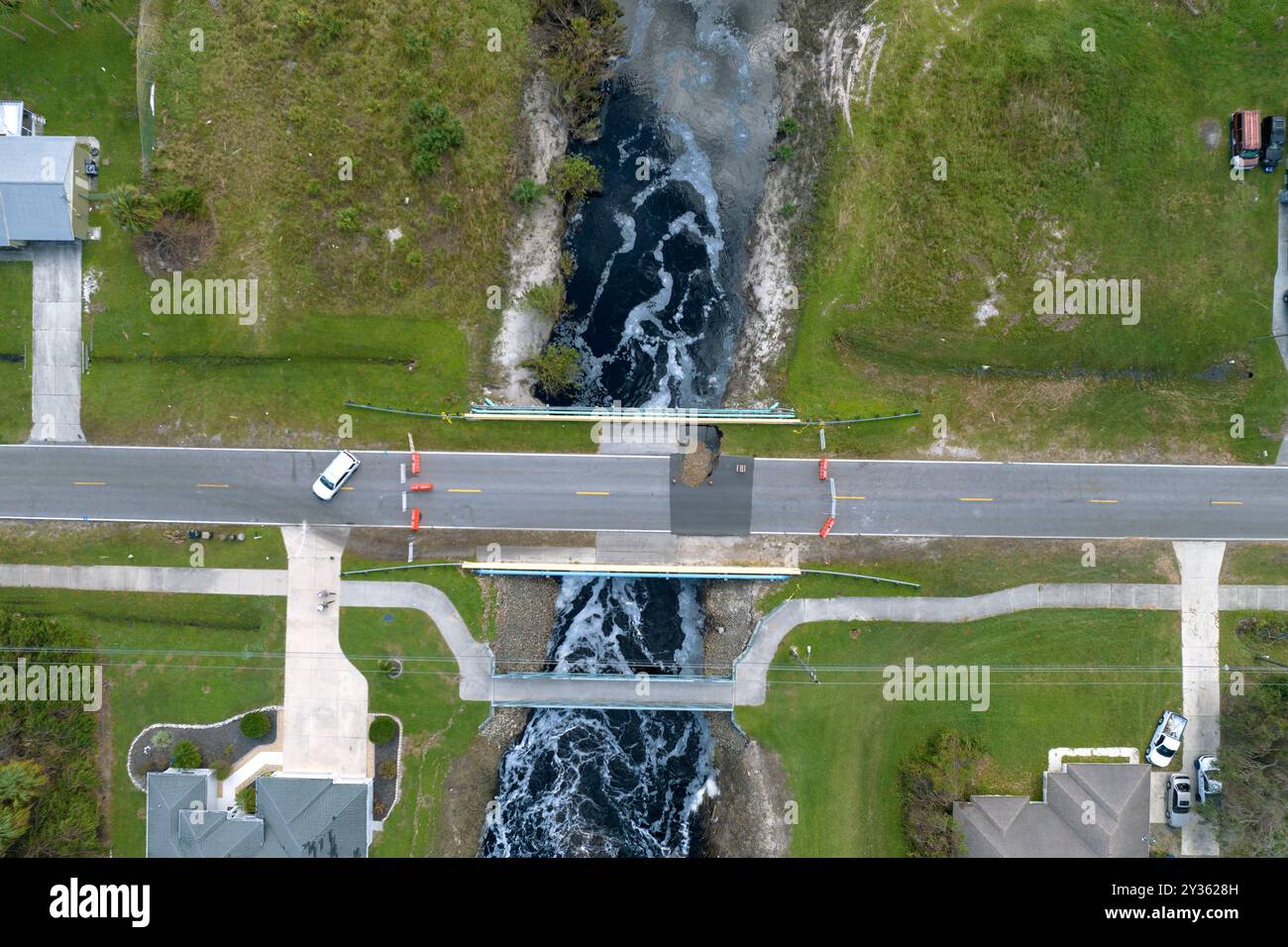 Repair of destroyed bridge after hurricane flood in Florida ...