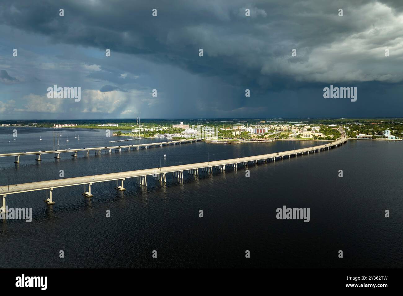 Stormy clouds forming from evaporating humidity of ocean water before ...