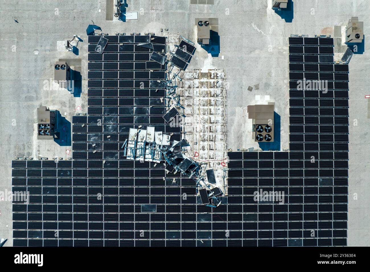 Top view of destroyed by hurricane Ian photovoltaic solar panels ...