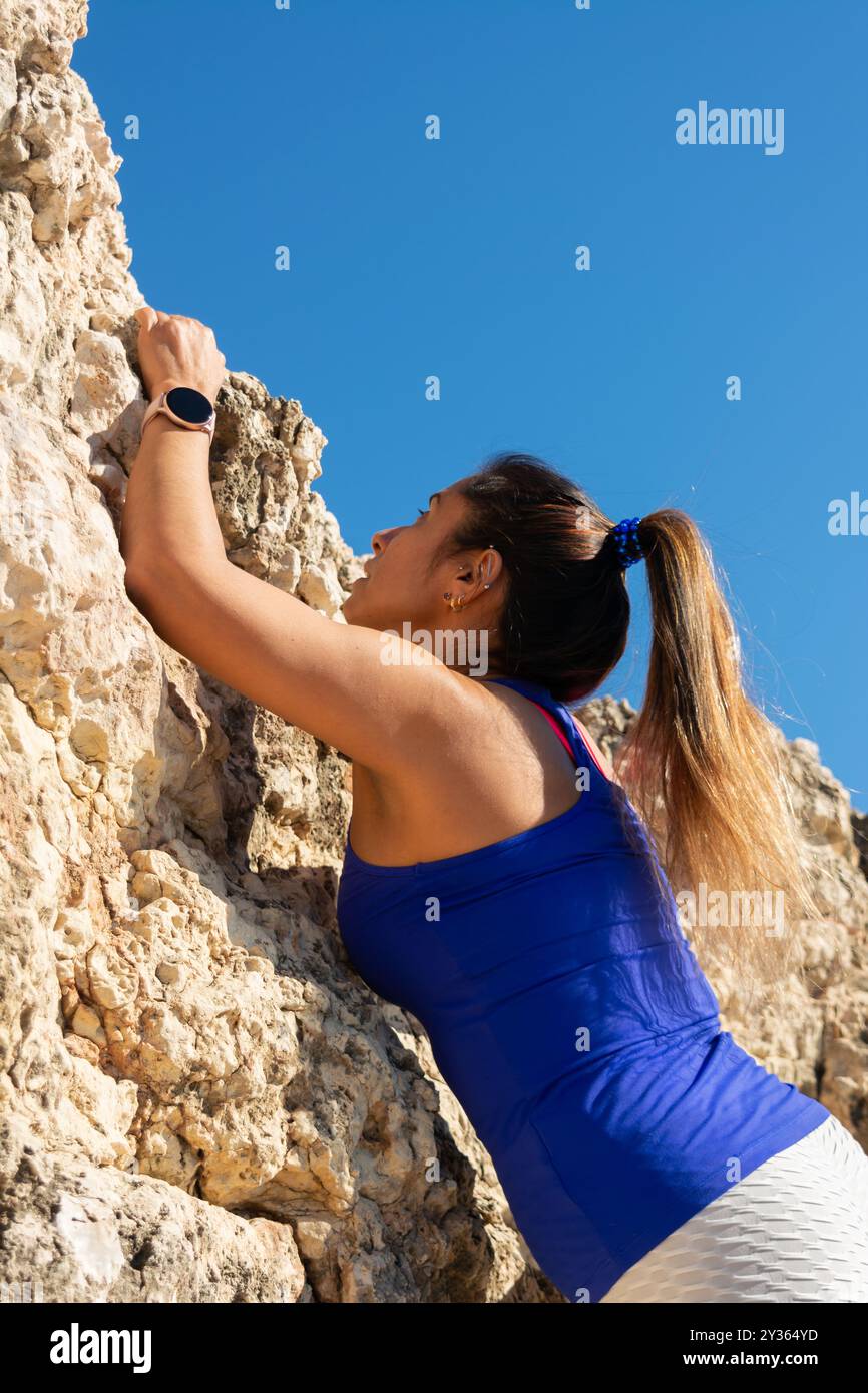 Close up woman climbing rocky hi-res stock photography and images - Alamy