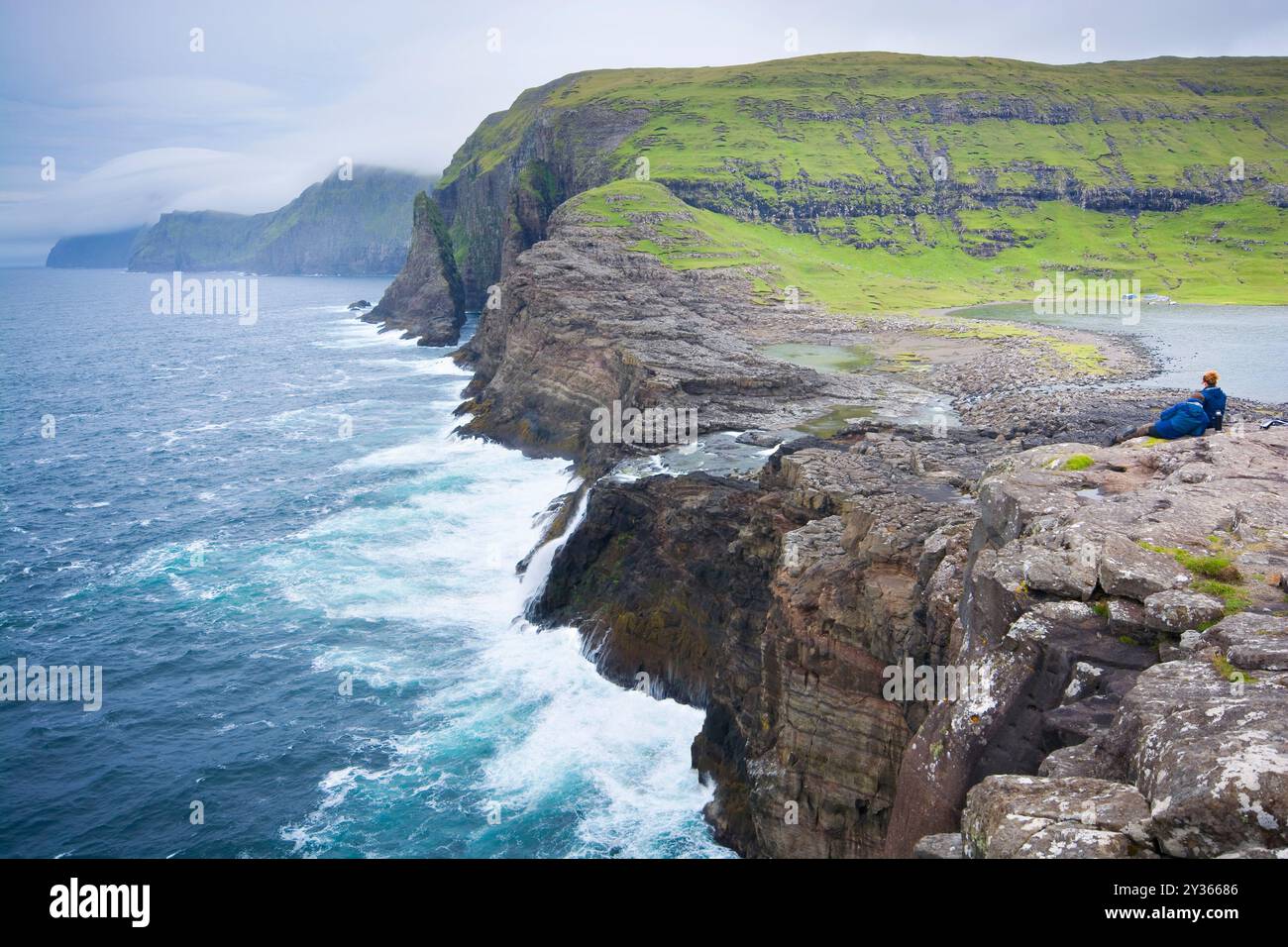 Bøsdalafossur waterfall in the Faroe Islands that flows from Leitisvatn ...