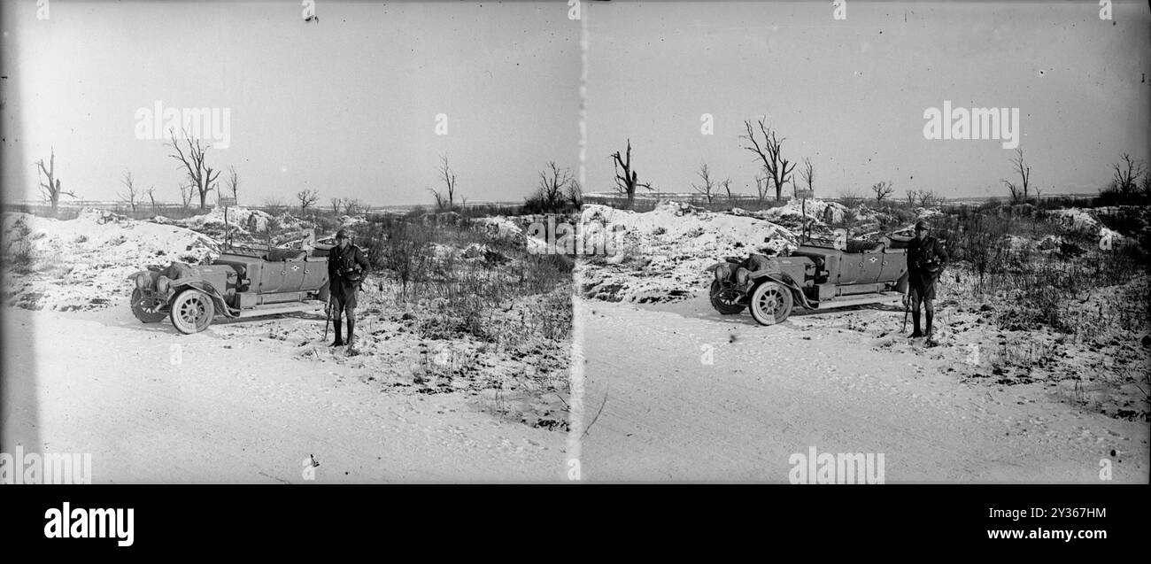 World War 1 French soldier standing next to his car on a road somewhere ...