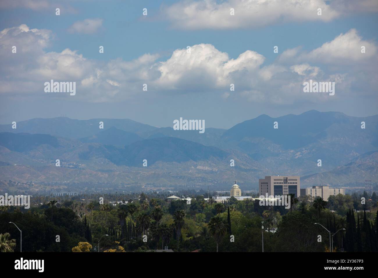 Sweltering heat rises from the valley in front of the downtown skyline ...
