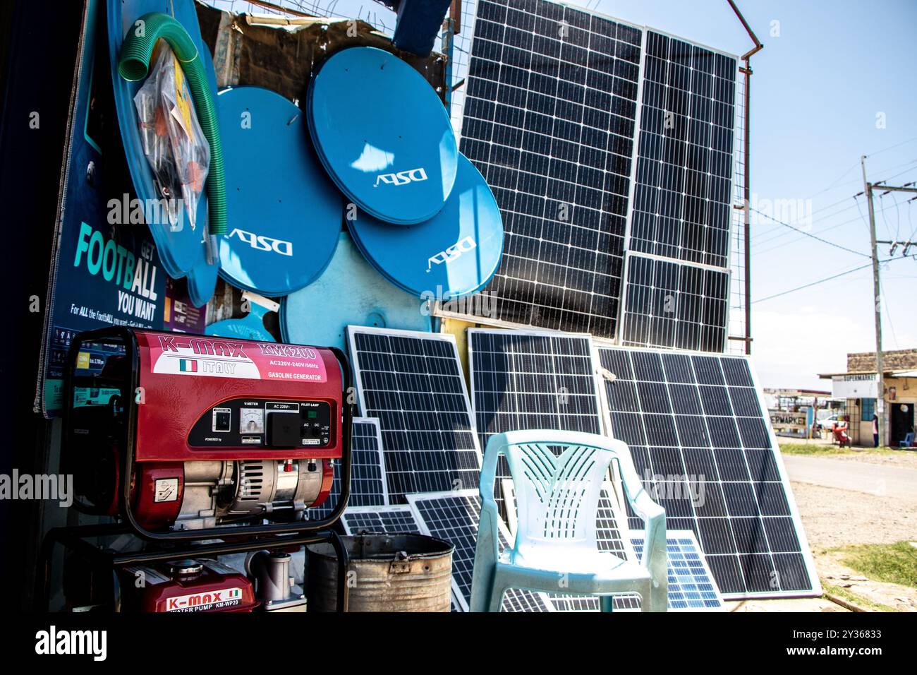 An electronic shop displaying solar panels among other products near ...