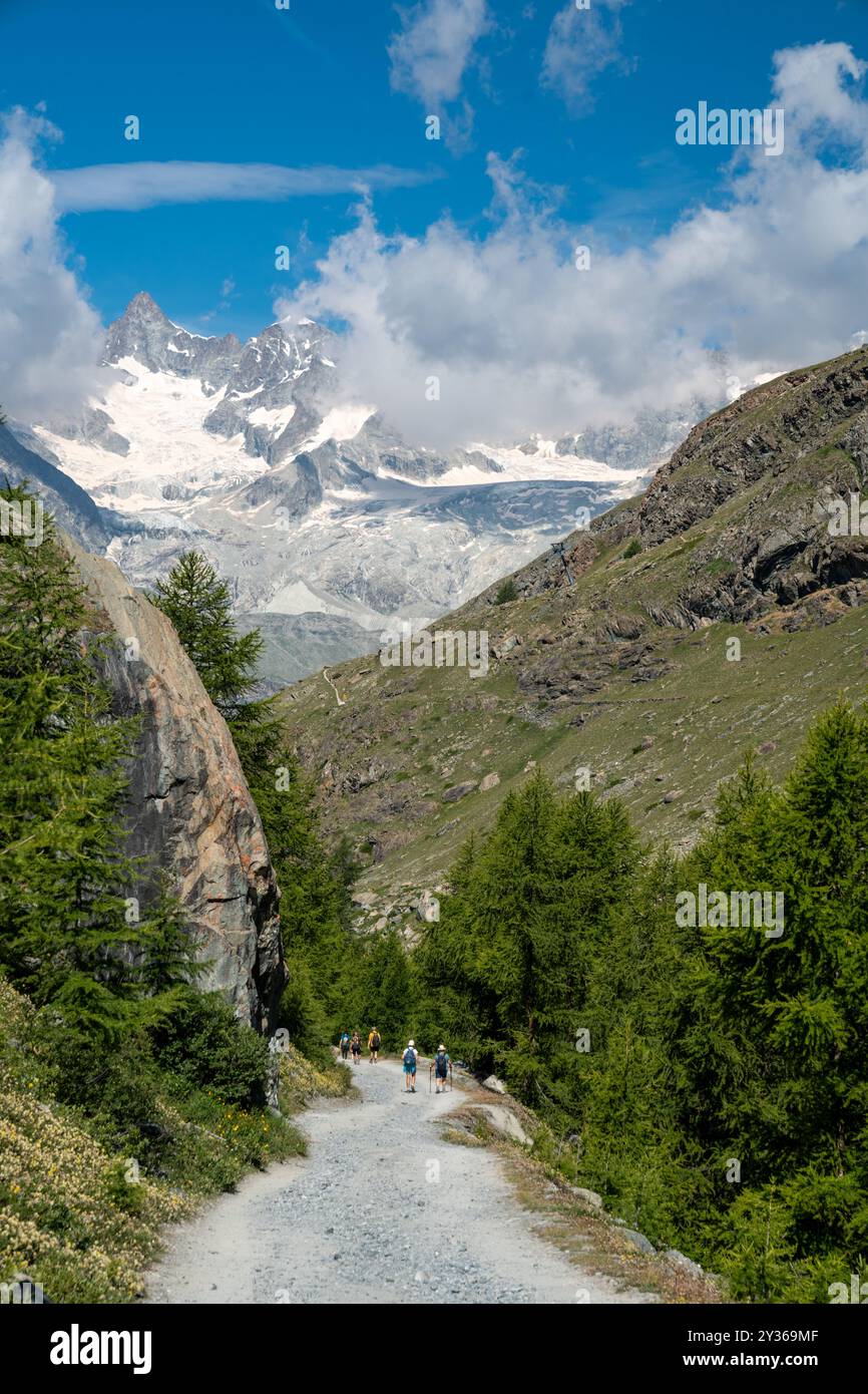 Zermatt, Switzerland - July 27, 2024: Hikers on the Five Lakes Trail in ...