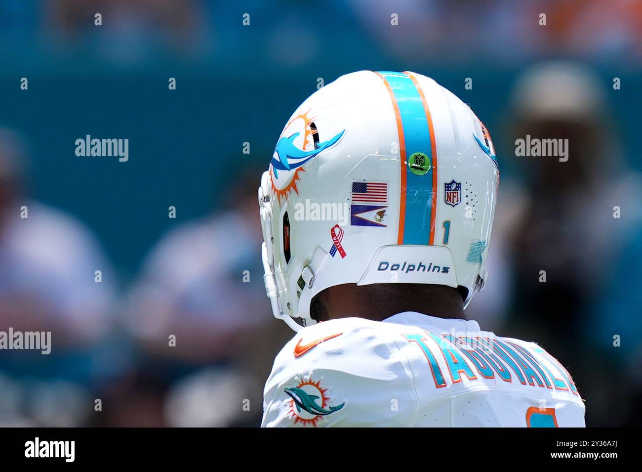 Miami Dolphins quarterback Tua Tagovailoa is shown with stickers on the ...