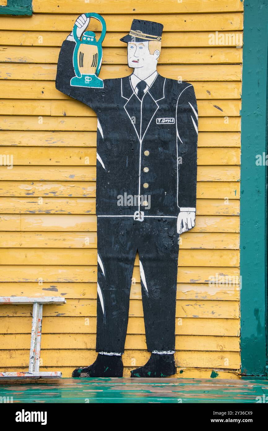 Sign of a train conductor carrying a lantern at the railway museum in ...