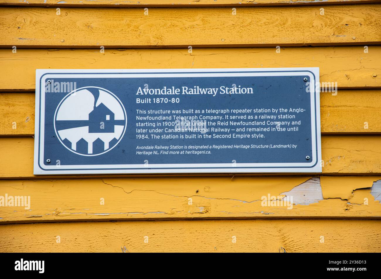 Heritage structure sign on the history of the station at the railway ...