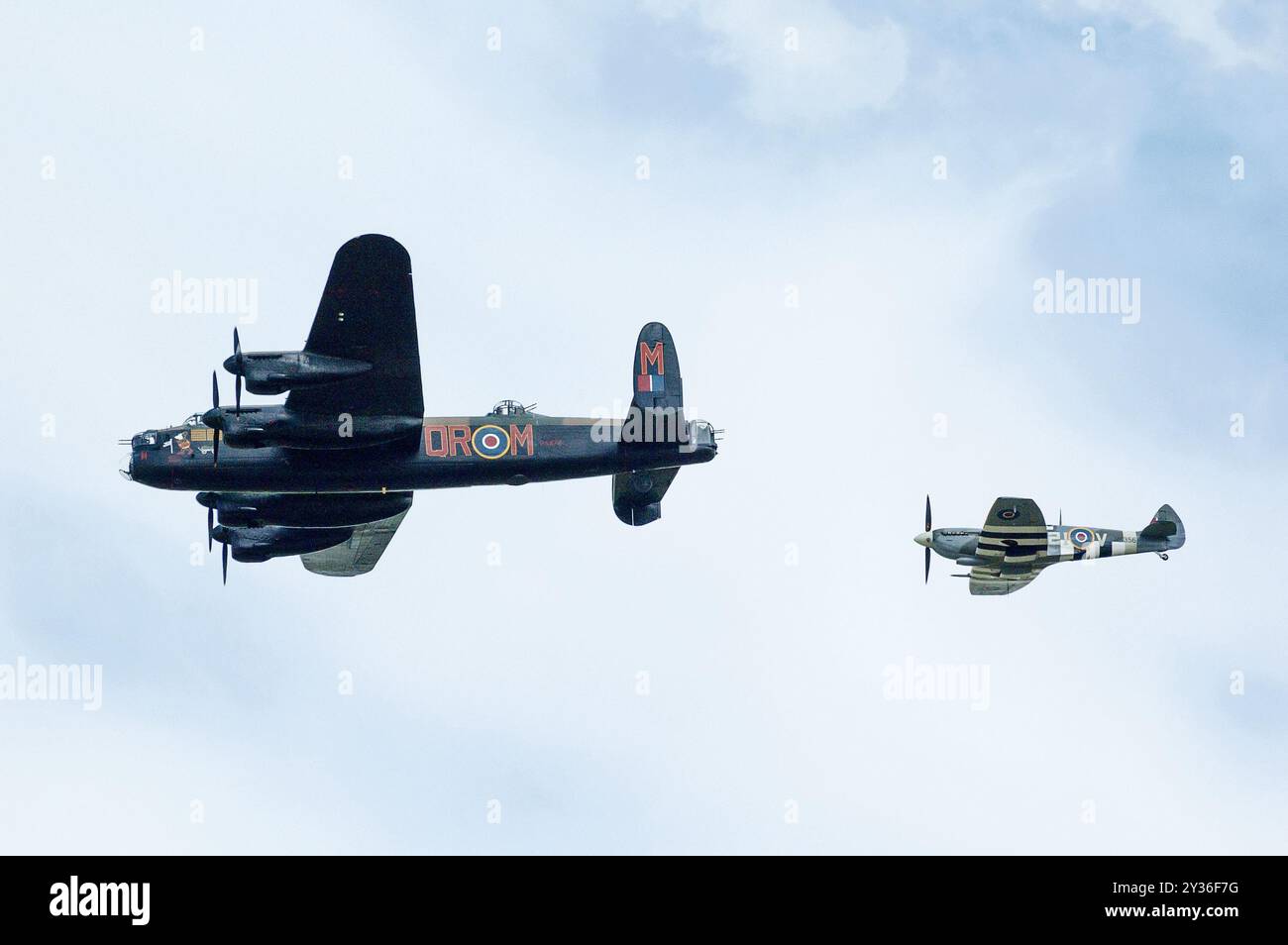 Avro Lancaster PA474 heavy bomber and Spitfire MK356 flying at the RAF ...