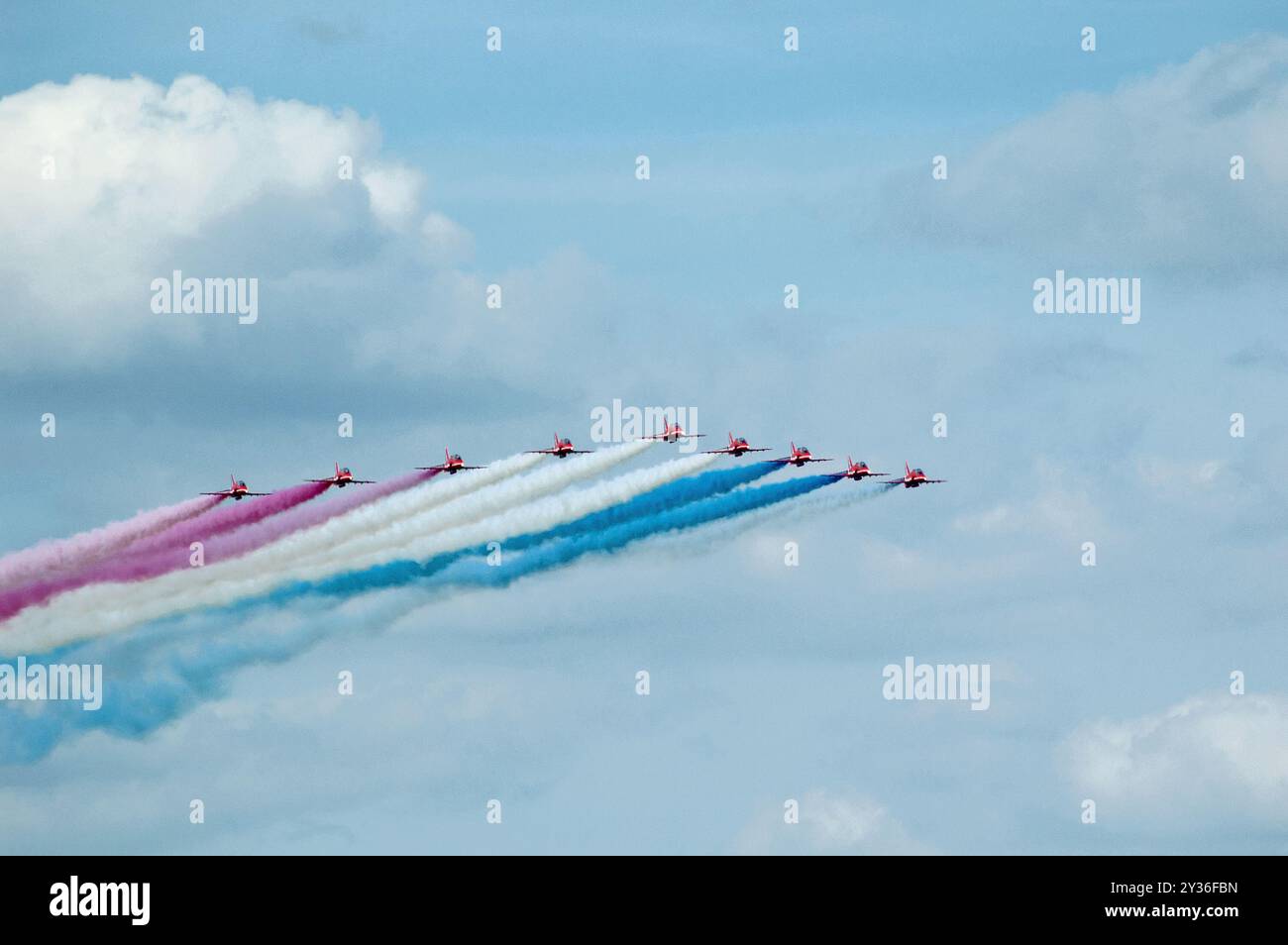 The Royal Air Force Aerobatic Team, the Red Arrows flying at the RAF ...