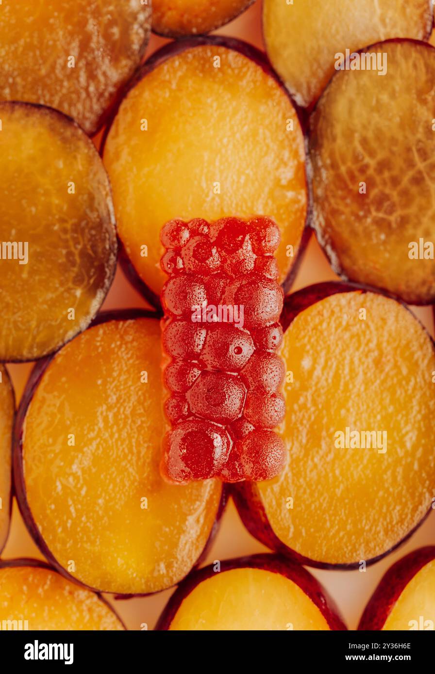 Natural plum marmalade on fresh sliced plums, vibrant color and texture ...