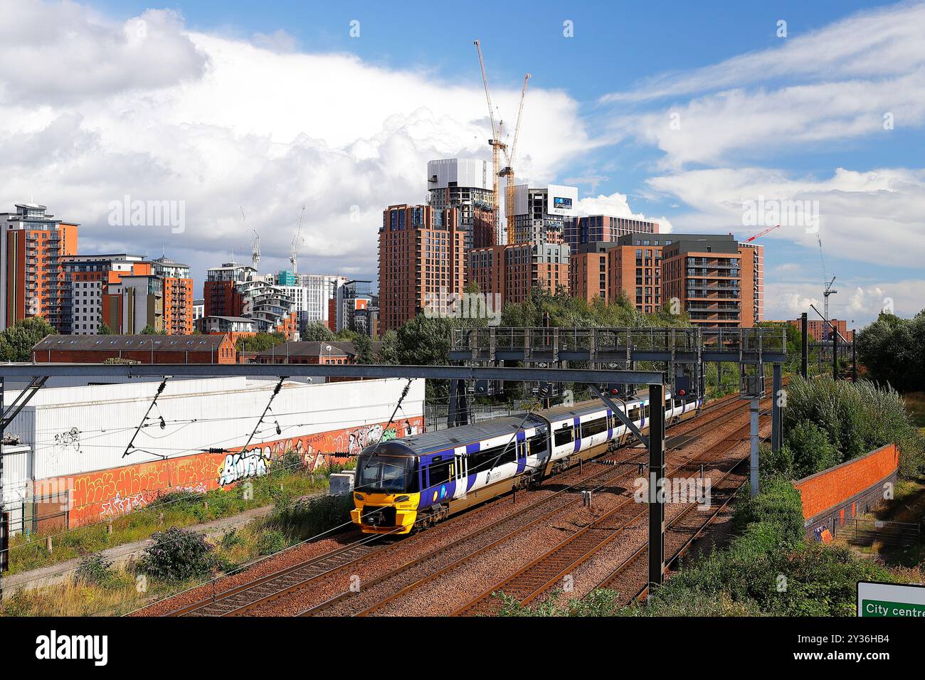 A Northern Arriva train heading into Leeds City Centre. The Junction ...