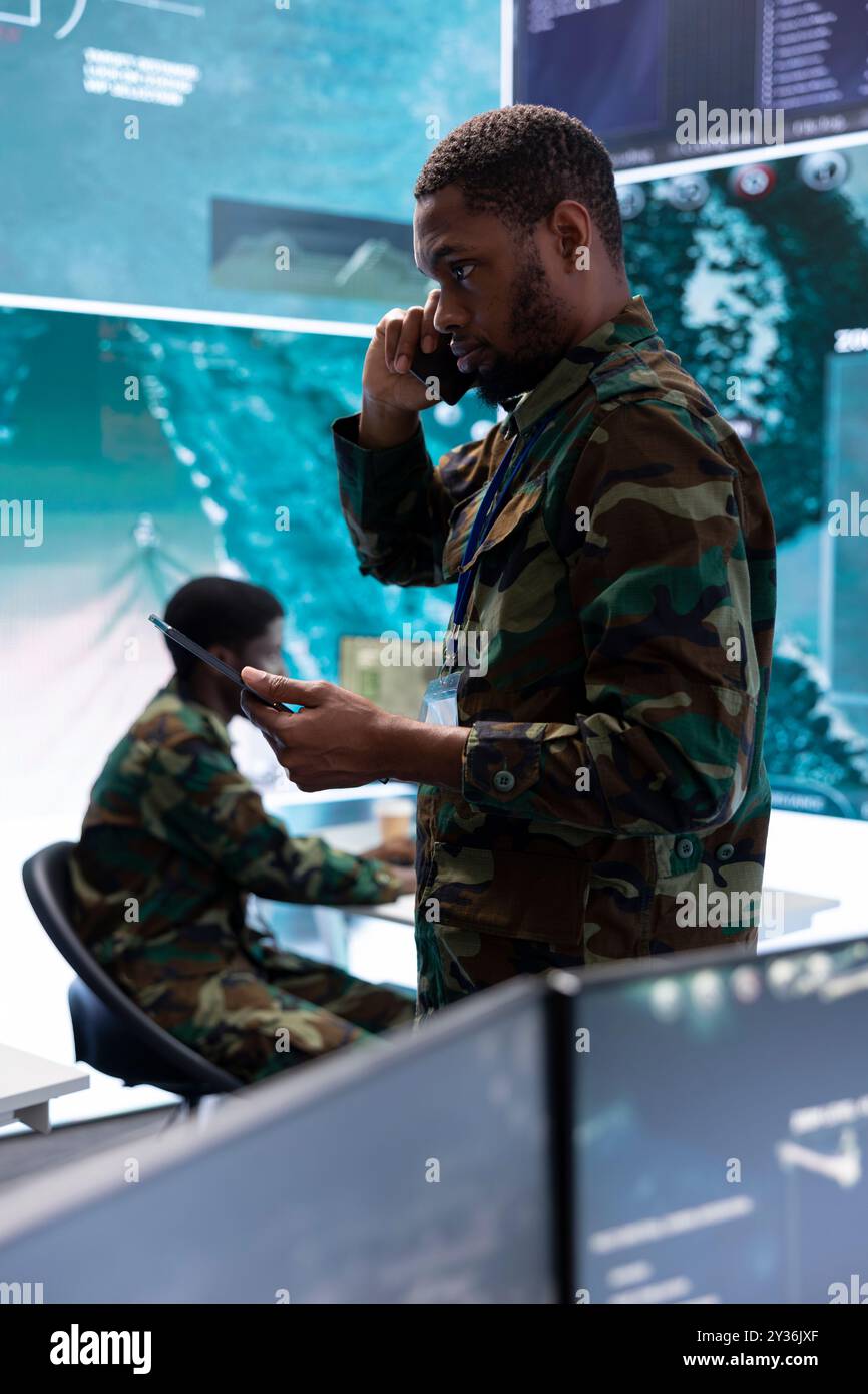 Military expert in high tech command post communicate satellite data ...
