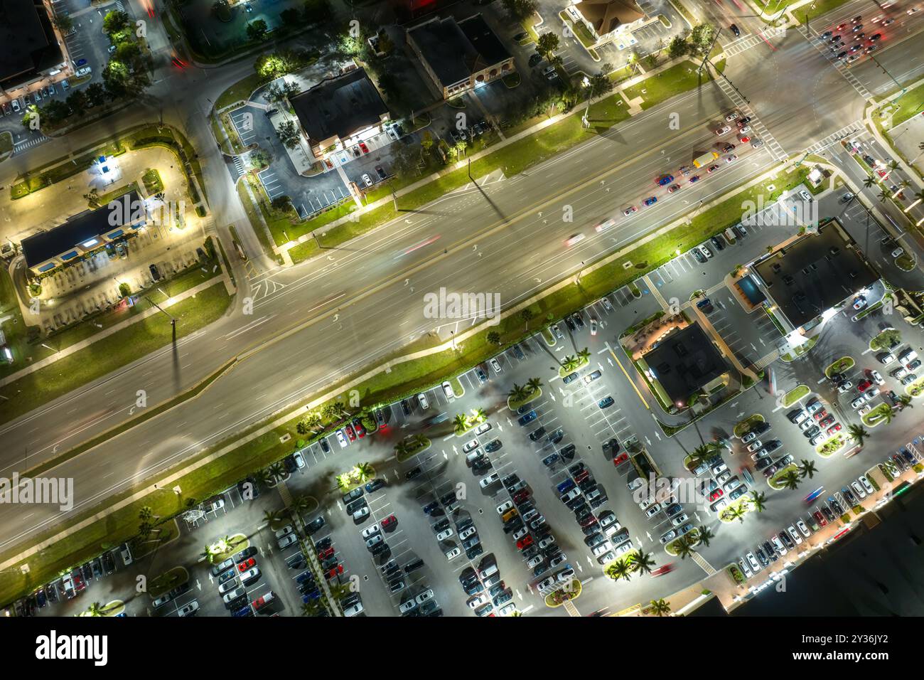 Strip mall plaza in North Port, Florida with illuminated traffic ...