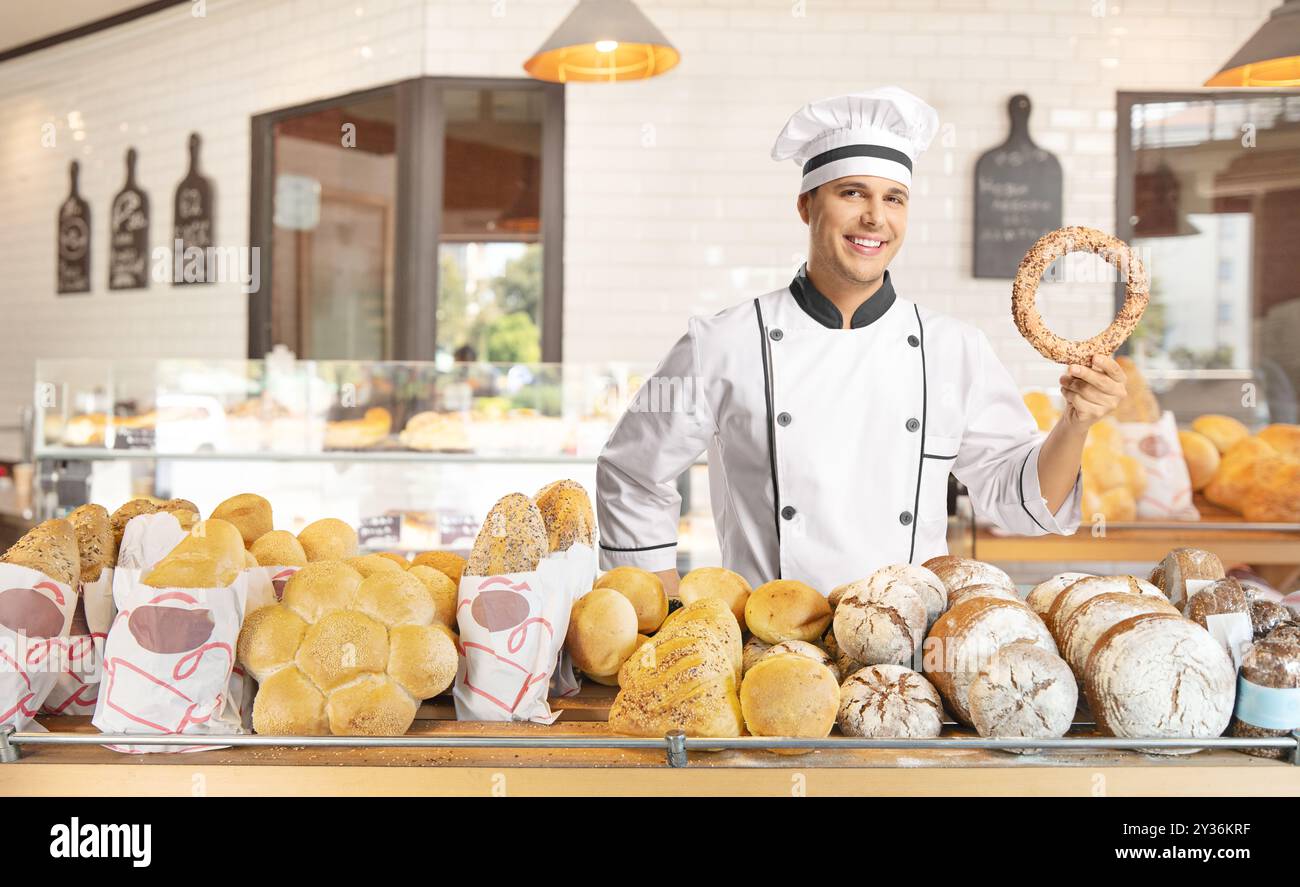 Male baker working in bakery hi-res stock photography and images - Alamy
