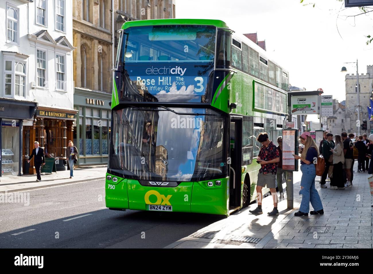 Passengers boarding a green double decker Rose Hill 3 bus on George ...